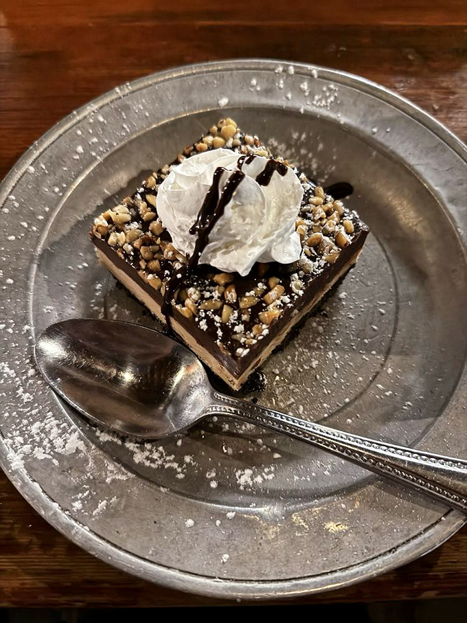 A dessert that understands the importance of textural contrast&mdash;creamy, crunchy, and chocolatey in perfect harmony. The whipped cream isn't an afterthought but a necessary final touch.