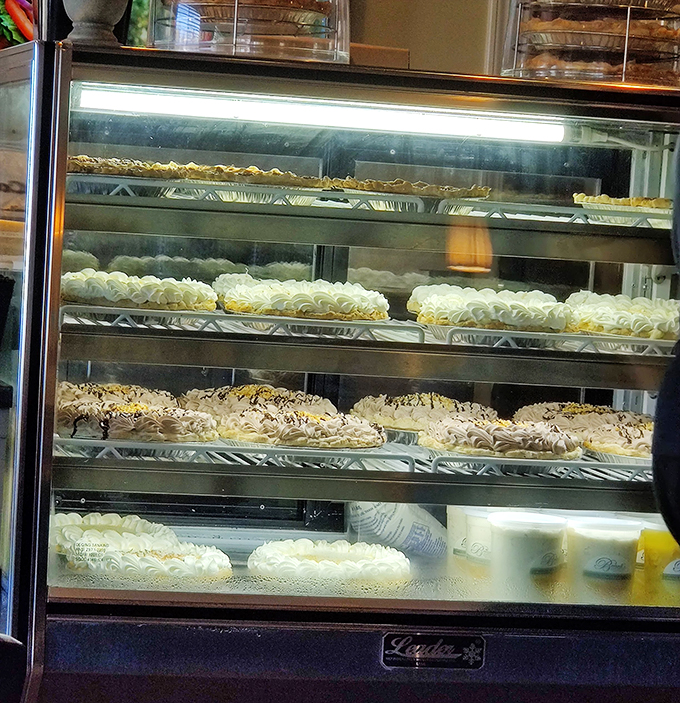 The dessert case&mdash;where willpower goes to die and "I'll just have a bite of yours" becomes the biggest lie of the day.