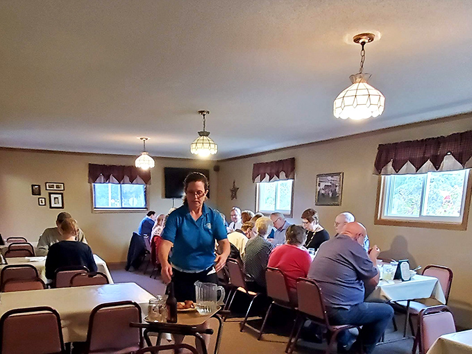 The dining room buzzes with the energy of happy eaters, where servers deliver platters of chicken with the confidence of Olympic torch bearers.