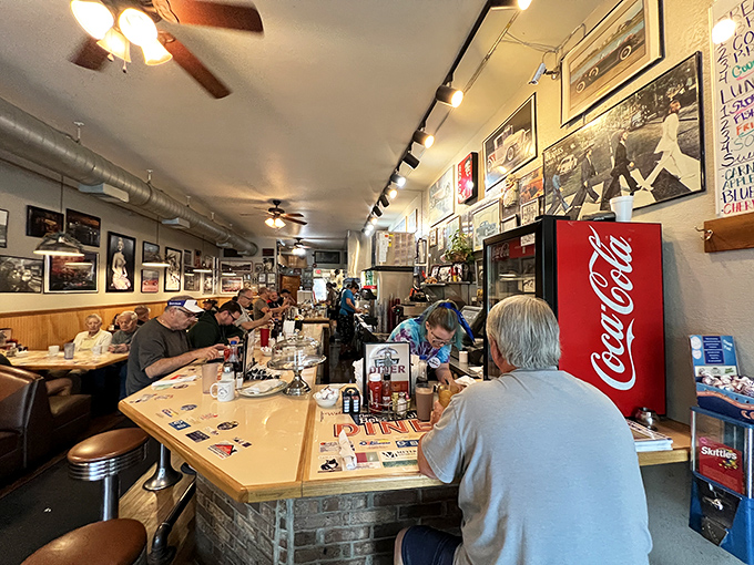 The counter where strangers become friends and diet plans go to die. A symphony of coffee cups and conversation.
