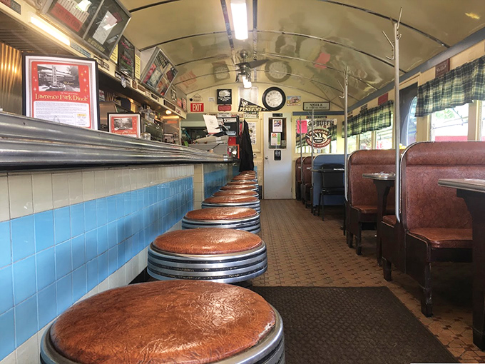 The row of empty stools awaits the day's visitors. Each one has supported decades of conversations, celebrations, and everyday moments.
