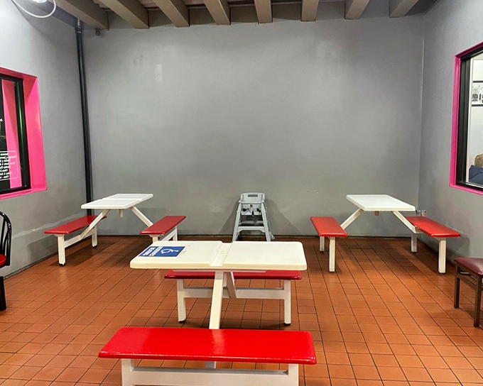 Clean, spacious dining room with picnic-style seating encourages lingering over every last delicious bite. 