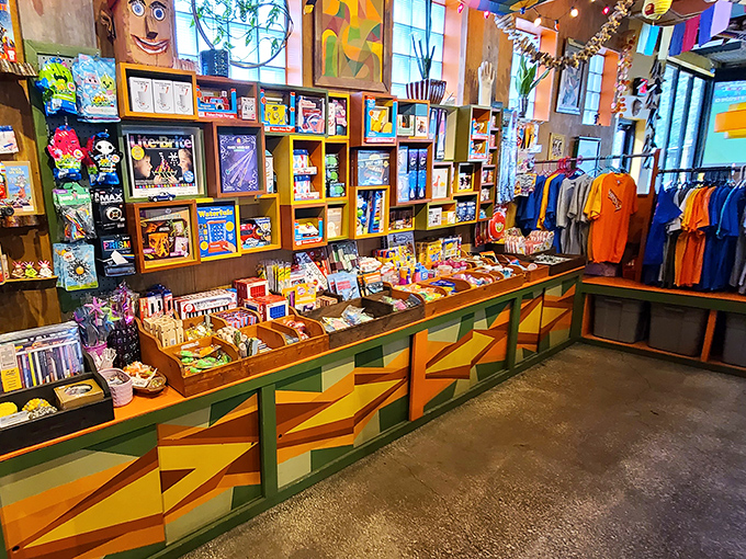 The gift shop: where you can take home a piece of Satchel's magic, because sometimes a t-shirt is also a souvenir of joy.