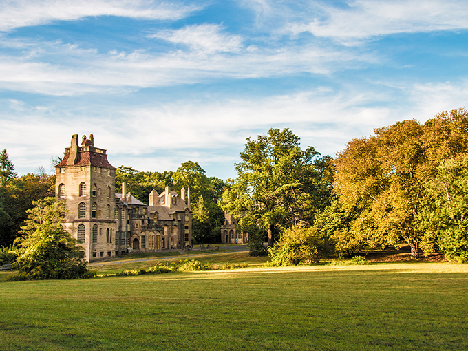 Fonthill Castle in golden afternoon light looks like it was teleported from a European hillside and landed, quite contentedly, in Doylestown's gentle landscape.