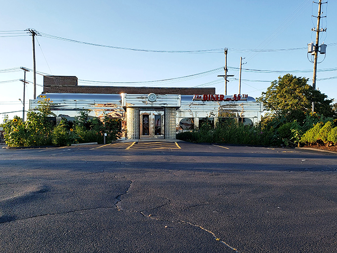 Dawn breaks over this stainless steel sanctuary, where early risers will soon gather for the daily ritual of eggs, coffee, and conversation.