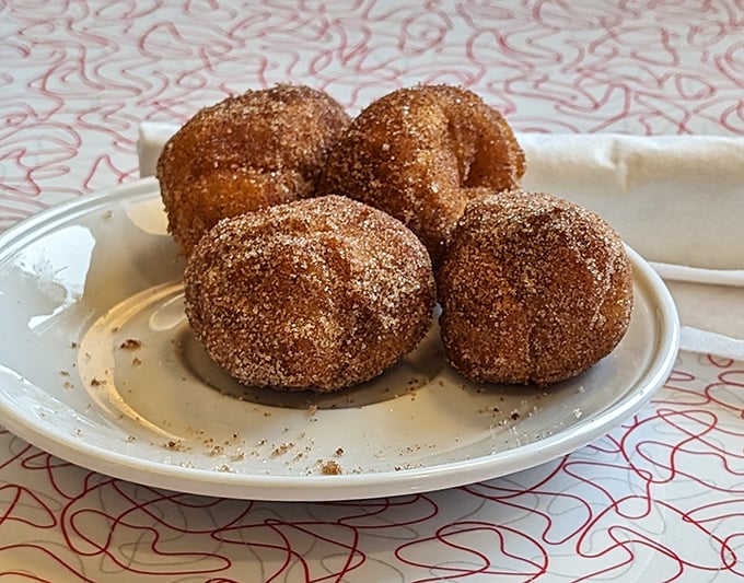 Cinnamon-sugar donut holes that disappear faster than you can say "just one more"&mdash;the perfect sweet ending to a diner feast.