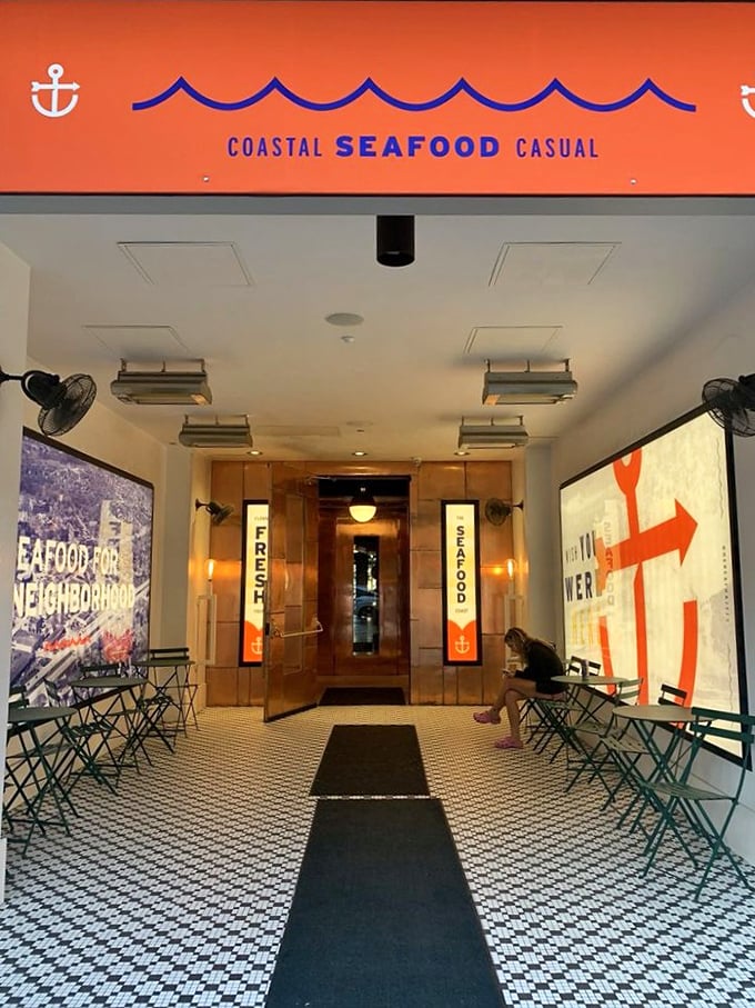 "Coastal Seafood Casual" isn't just a tagline&mdash;it's Hazel's promise to Birmingham, spelled out in bright orange above a welcoming entrance.