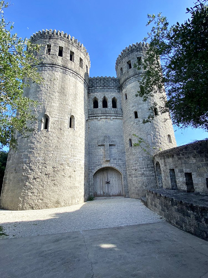 The imposing entrance welcomes visitors into a world where medieval fantasy becomes Florida reality.