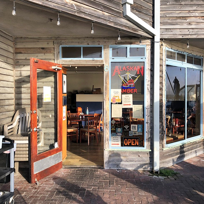 That red door isn't just an entrance—it's a portal to the kind of coastal dining experience that makes Californians feel smug about where they live.