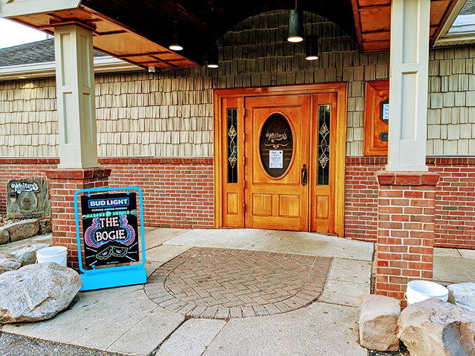 The wooden entrance with its stained glass insert doesn't just say "come in"&mdash;it promises you're about to join a treasured Ohio tradition.