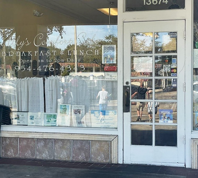 Those white curtains and hand-painted window lettering say everything: this isn't a place that needs to shout about its greatness.