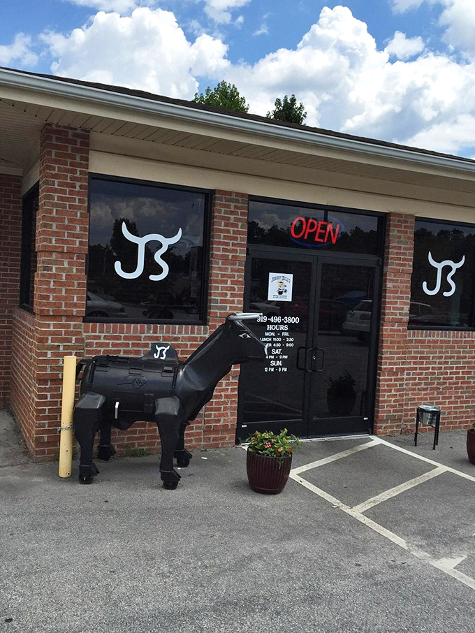 The entrance says it all: unpretentious, welcoming, and guarded by a metal bull that's practically the restaurant's mascot.