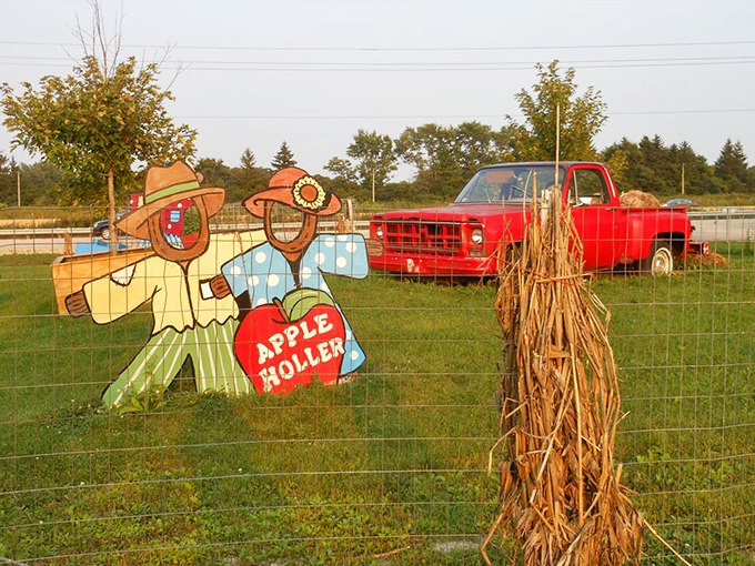 Vintage farm displays and scarecrows greet visitors with nostalgic charm. This entrance sets the stage for an authentic Wisconsin farm experience.