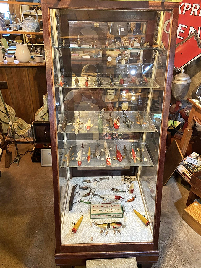 The fisherman's dream cabinet! Vintage lures and tackle that prove catching fish has always been equal parts art, science, and colorful deception.
