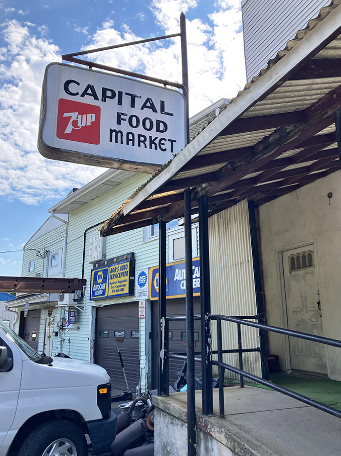 The Capital Food Market's vintage 7UP sign has weathered decades of Shenandoah summers. Corner stores like this are the lifeblood of affordable small-town living
