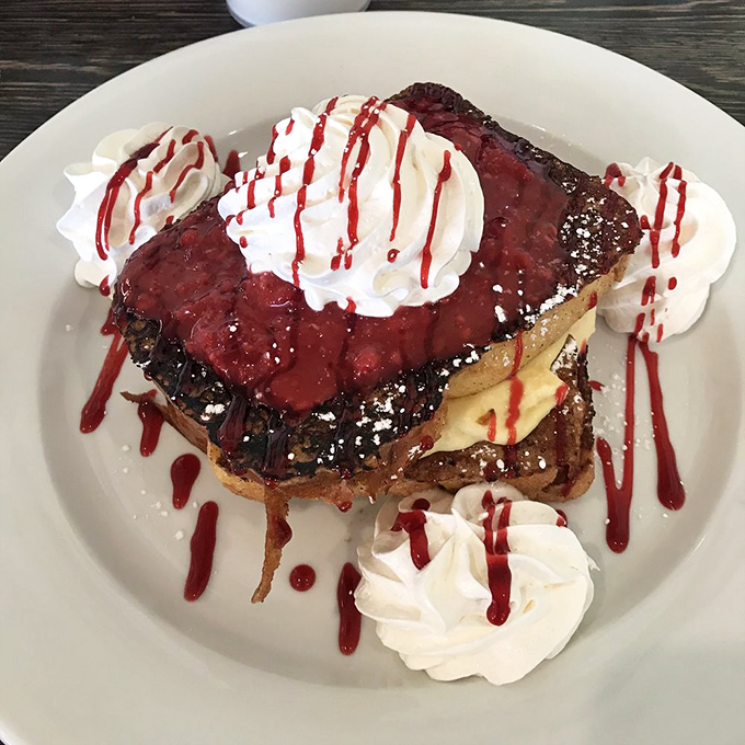 French toast wearing whipped cream like a fancy hat &ndash; because breakfast deserves to feel special too.