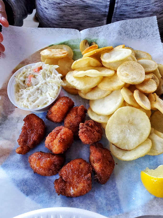 Fried scallops with the ideal ratio of crispy coating to tender interior. That generous portion means you'll be thinking about these beauties long after the meal ends.