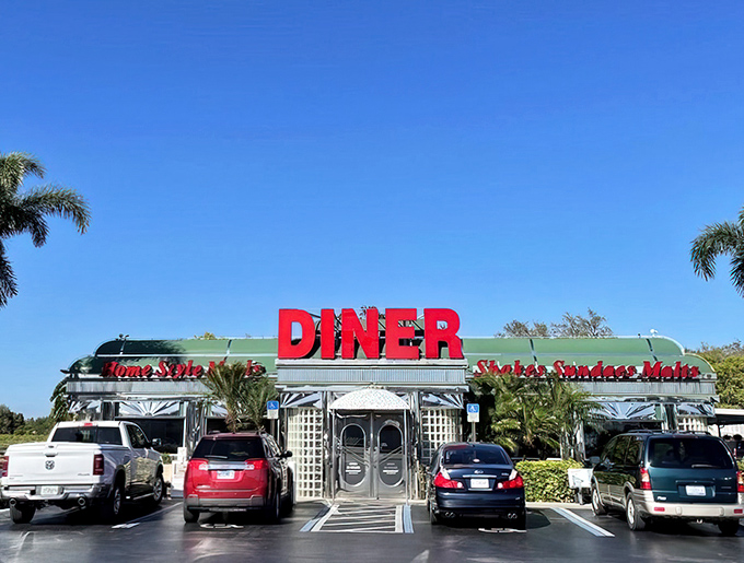 The front view that's launched a thousand U-turns from hungry drivers. Those glass blocks and stainless steel trim scream "authentic diner experience inside." 