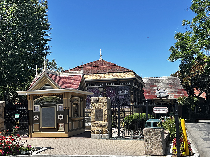 The ornate entrance gate hints at the architectural adventures waiting beyond these carefully manicured grounds.