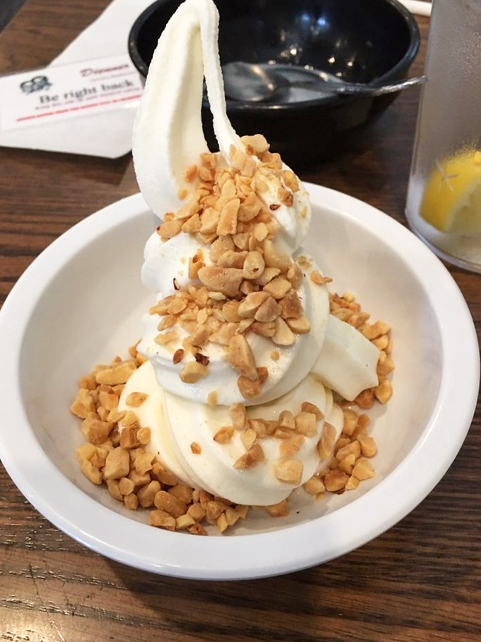 Soft-serve ice cream topped with crunchy nuts proves that dessert belongs at every great meal.