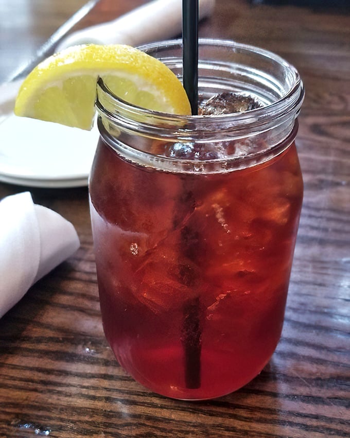 Sweet tea served in a mason jar with a lemon wedge&mdash;because some traditions, like Southern hospitality in the Midwest, just make perfect sense.