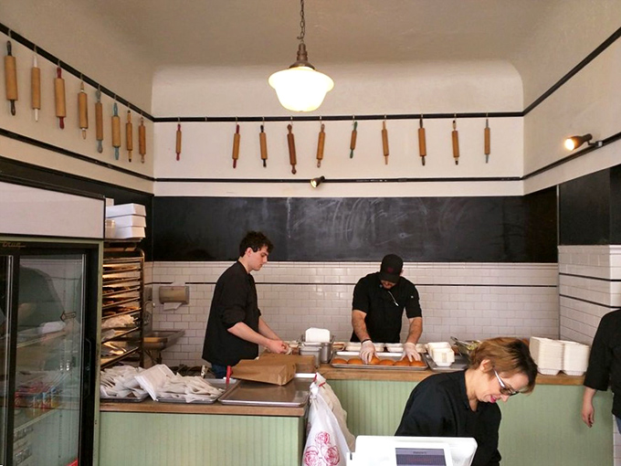 Behind the scenes where the magic happens&mdash;rolling pins hanging like trophies above a workspace where simplicity meets excellence.