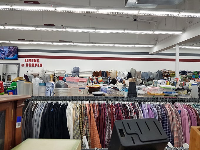 The "Linens & Drapes" section &ndash; where yesterday's window treatments and bedding await creative repurposing by thrifty home decorators.