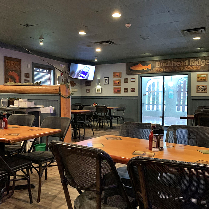 The dining room waits for the dinner rush like a theater before showtime. Those wooden tables have hosted more celebrations than a justice of the peace.