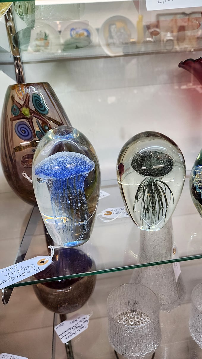 Captured forever in glass, these jellyfish paperweights bring ocean magic to your desktop &ndash; no stingers, just stunning craftsmanship.