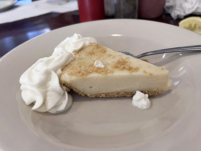 Key lime pie—the perfect sweet finale that bridges your New England seafood feast with a little Florida sunshine on a plate.