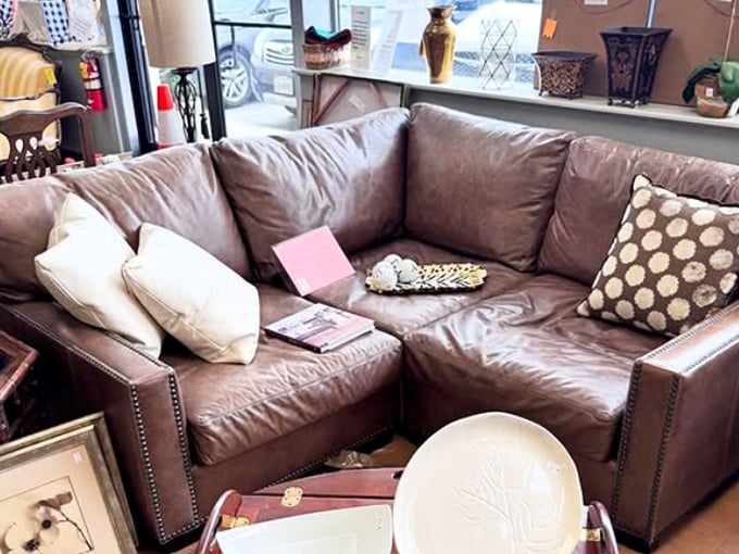 This leather couch has already survived someone else's kids and pets, which means it's perfectly seasoned for whatever your family throws at it.