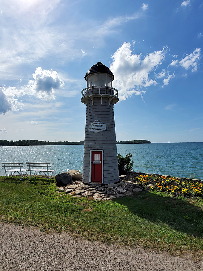 Historic lighthouses stand sentinel over waters that have guided travelers to this peaceful refuge for generations.