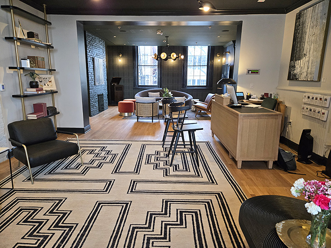 A reception area that sets the tone for your experience&mdash;geometric patterns and warm woods promising that attention to detail extends to everything you'll taste.