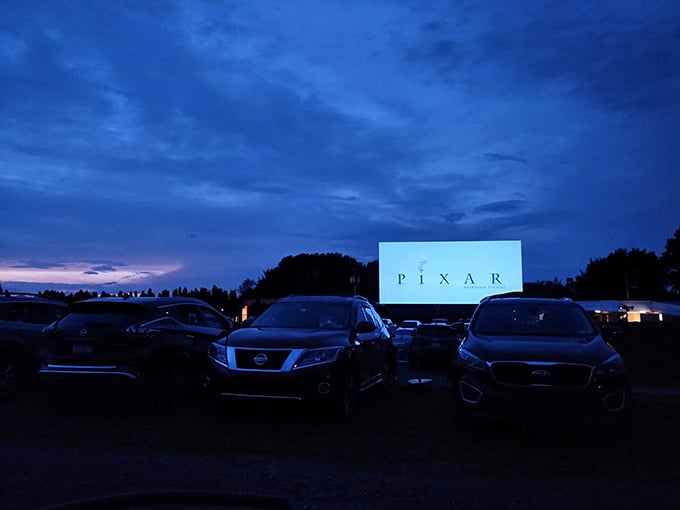 As darkness falls, the Pixar lamp illuminates more than just the screen&mdash;it lights up faces of all ages experiencing movie magic together.