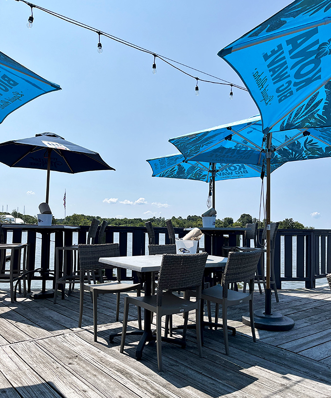 Waterfront dining under umbrellas where every meal comes with a side of gentle bay breezes and serenity.
