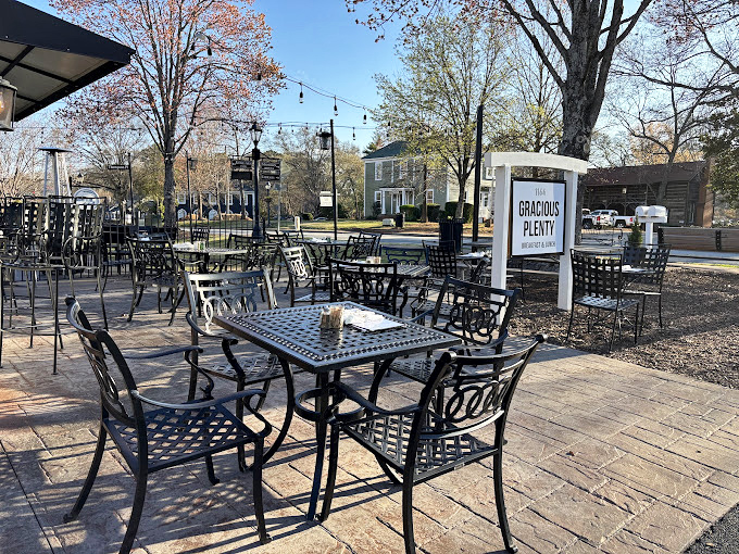 String lights hover above the outdoor patio—the perfect setting for savoring biscuits and coffee on those glorious Georgia mornings.