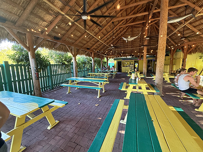 The outdoor dining area feels like eating in a friend's backyard&mdash;if your friend had the best food in the Keys and picnic tables painted in paradise colors.