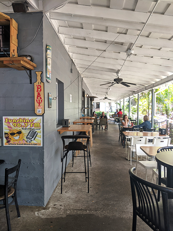 The covered patio offers a perfect middle ground between indoors and outdoors&mdash;where Florida's weather becomes your dining companion rather than your enemy.
