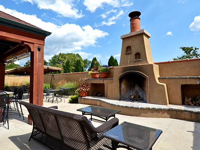 An outdoor patio that whispers "al fresco perfection" with its Southwestern-inspired fireplace and promise of starlit dining.