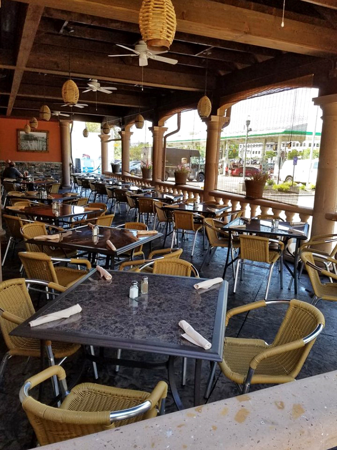 The outdoor patio offers al fresco dining with woven chairs and ceiling fans. It's like eating in a Mexican courtyard without having to worry about your passport.