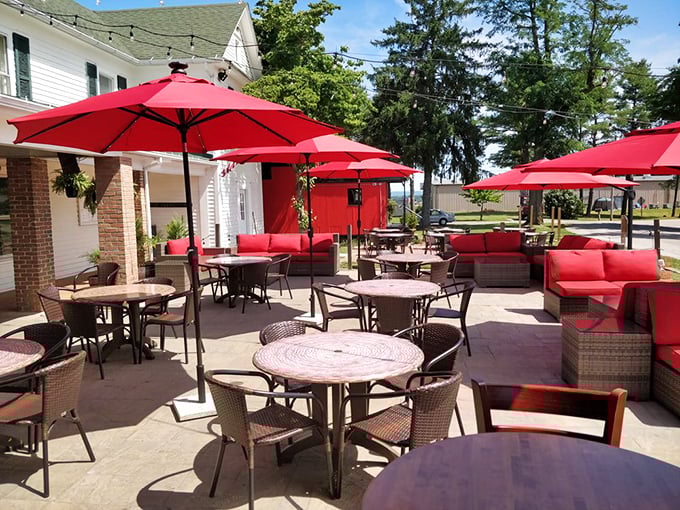 The outdoor patio with bright red umbrellas isn't just additional seating &ndash; it's your perfect spot for enjoying Virginia's beautiful weather.