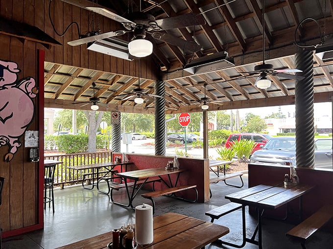 The covered patio offers a breezy spot to enjoy your barbecue bounty while watching the world go by &ndash; paper towel roll included, because they know what's coming.