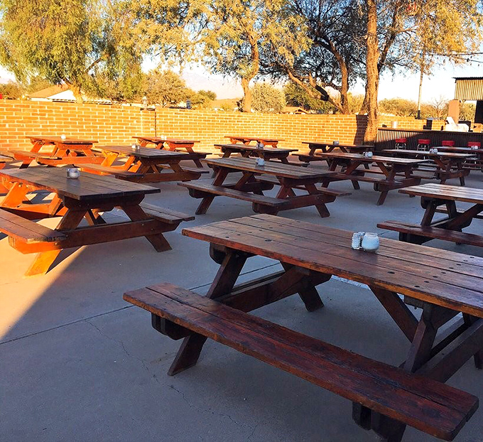 These picnic tables have hosted more memorable meals than most white-tablecloth establishments. In summer, they're the best seats in the house.