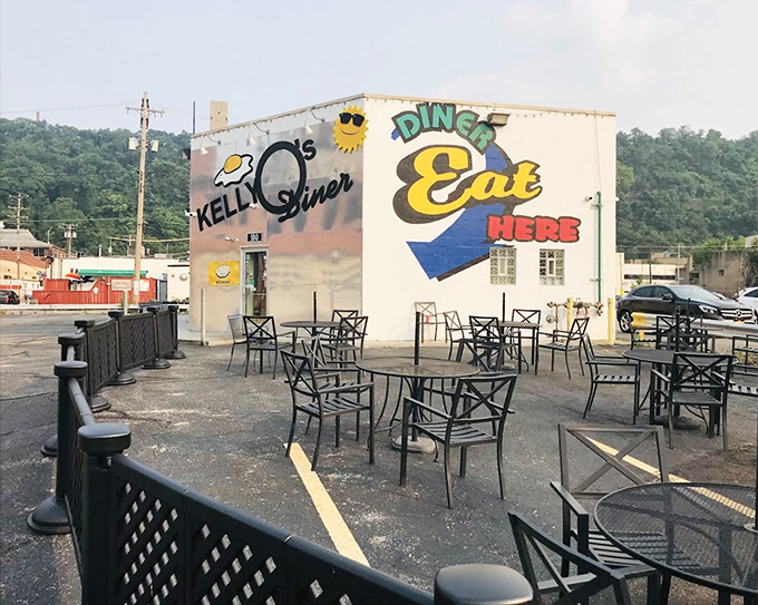 Outdoor seating for when your food coma requires fresh air. That "DINER EAT HERE" sign isn't just a suggestion—it's one of life's better decisions.