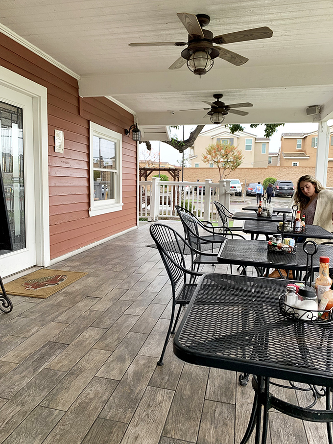 The covered patio offers the best of both worlds &ndash; fresh air and shade, perfect for those leisurely California mornings.