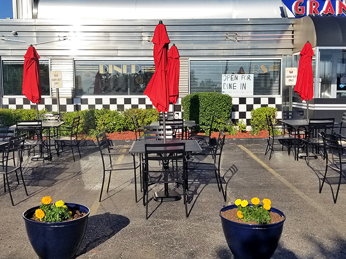 Outdoor seating for when Michigan weather cooperates. Those red umbrellas aren't just for shade&mdash;they're beacons calling you home.