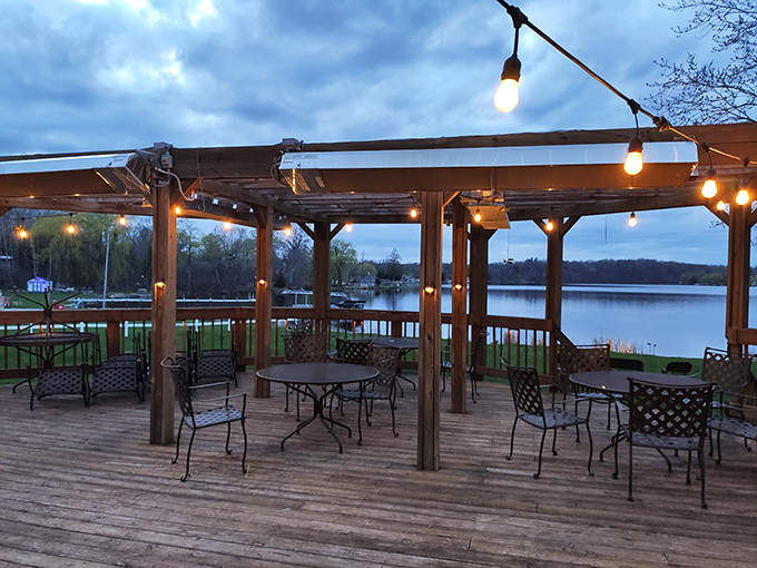 Twinkling lights illuminate the outdoor deck where lake breezes and great food create magical Wisconsin summer dining experiences.