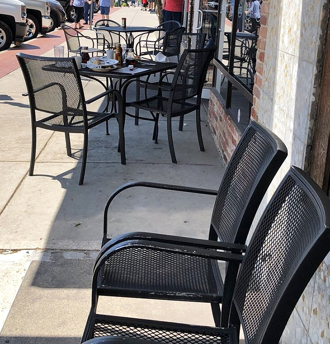Outdoor seating offers the perfect perch for people-watching while debating whether to order dessert or just another chicken fried steak.