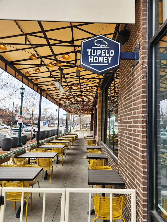 The outdoor seating area with its cheerful yellow chairs isn't just pandemic-friendly&mdash;it's the perfect stage for people-watching while savoring Southern delights.