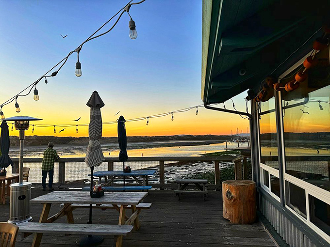 The outdoor deck at sunset&mdash;where the golden hour transforms a simple meal into a California moment worth remembering long after the last bite.